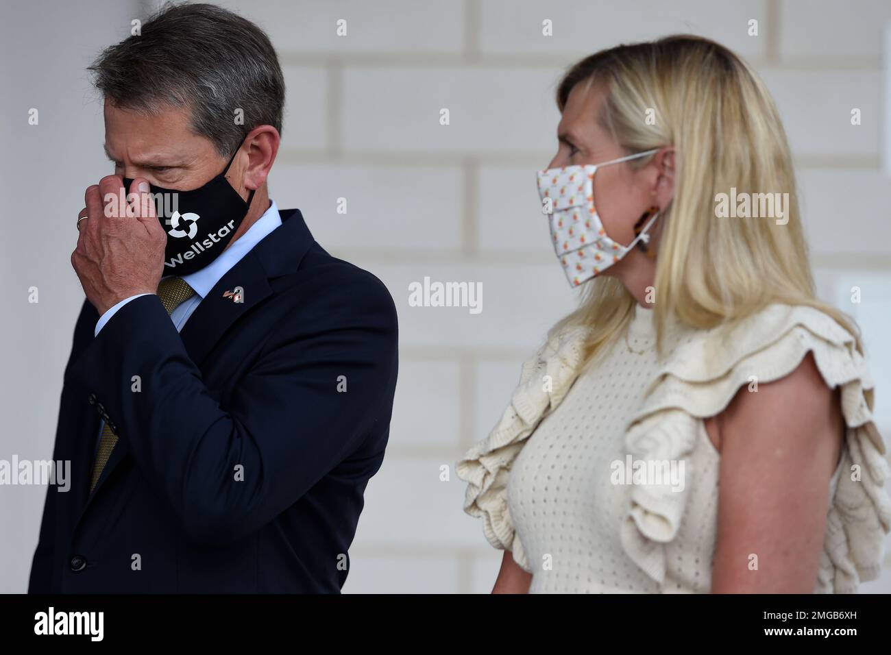 Georgia Gov. Brian Kemp speaks first lady Marty Kemp at Wellstar ...
