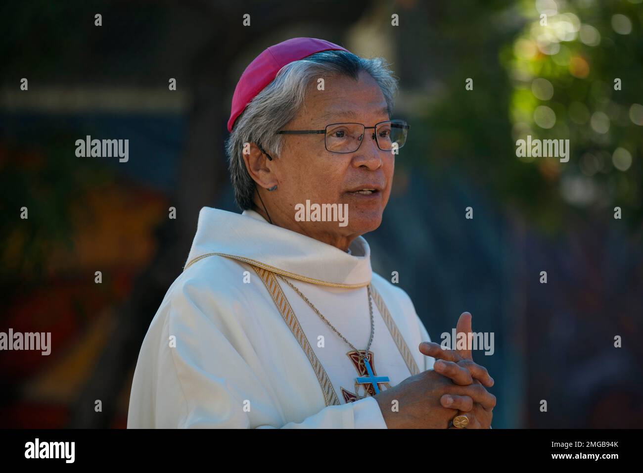 Bishop Alex Aclan attends an ordination ceremony at Dolores Mission ...