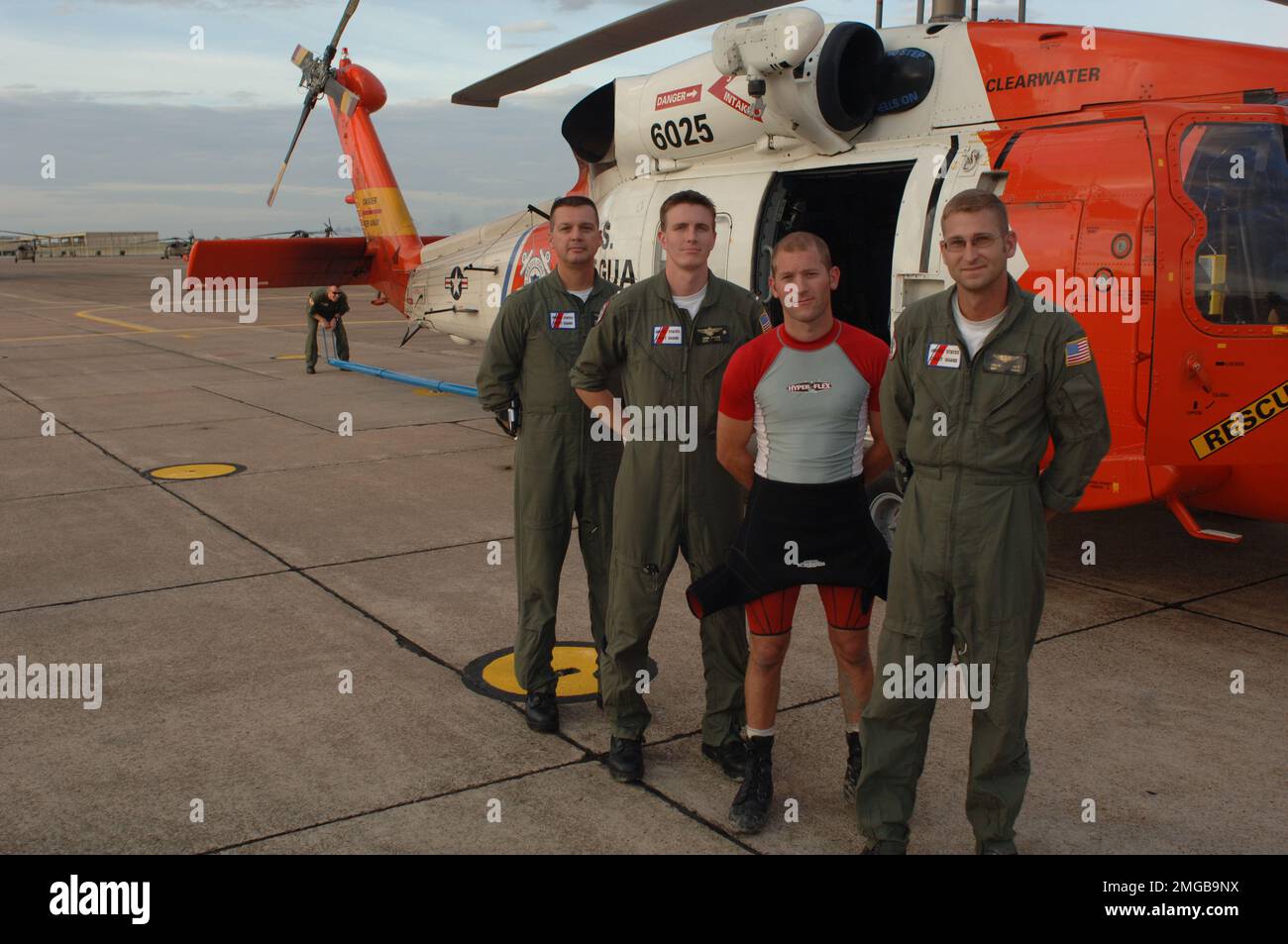 . Coast Guard air crew in front HH-60 on ramp --- 050924. Hurricane ...