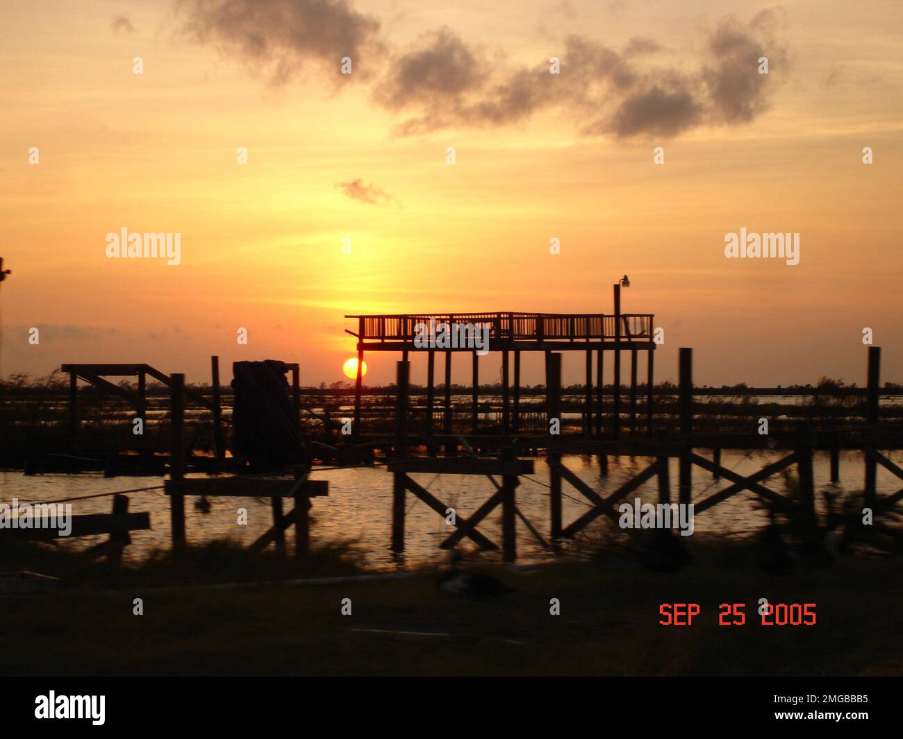 Aftermath - Miscellaneous - 26-HK-48-76. North Shore--sunset over water ...