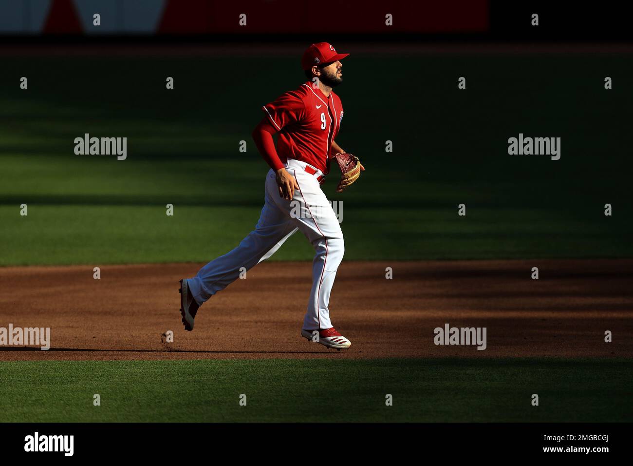 Cincinnati Reds' Mike Moustakas (9) runs to the dugout in an intrasquad ...