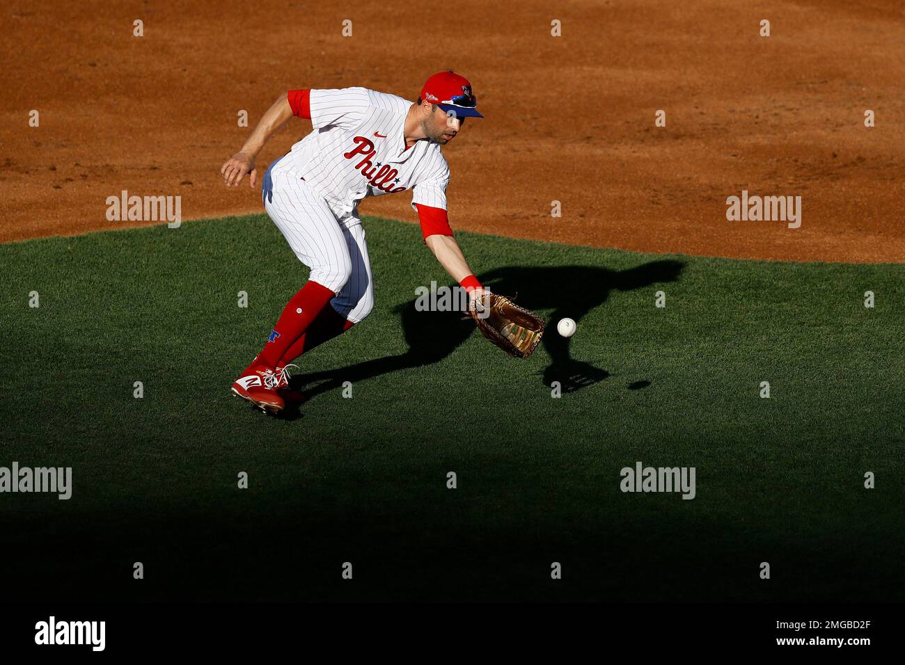 Philadelphia Phillies' Neil Walker fields a grounder by Nick Martini ...
