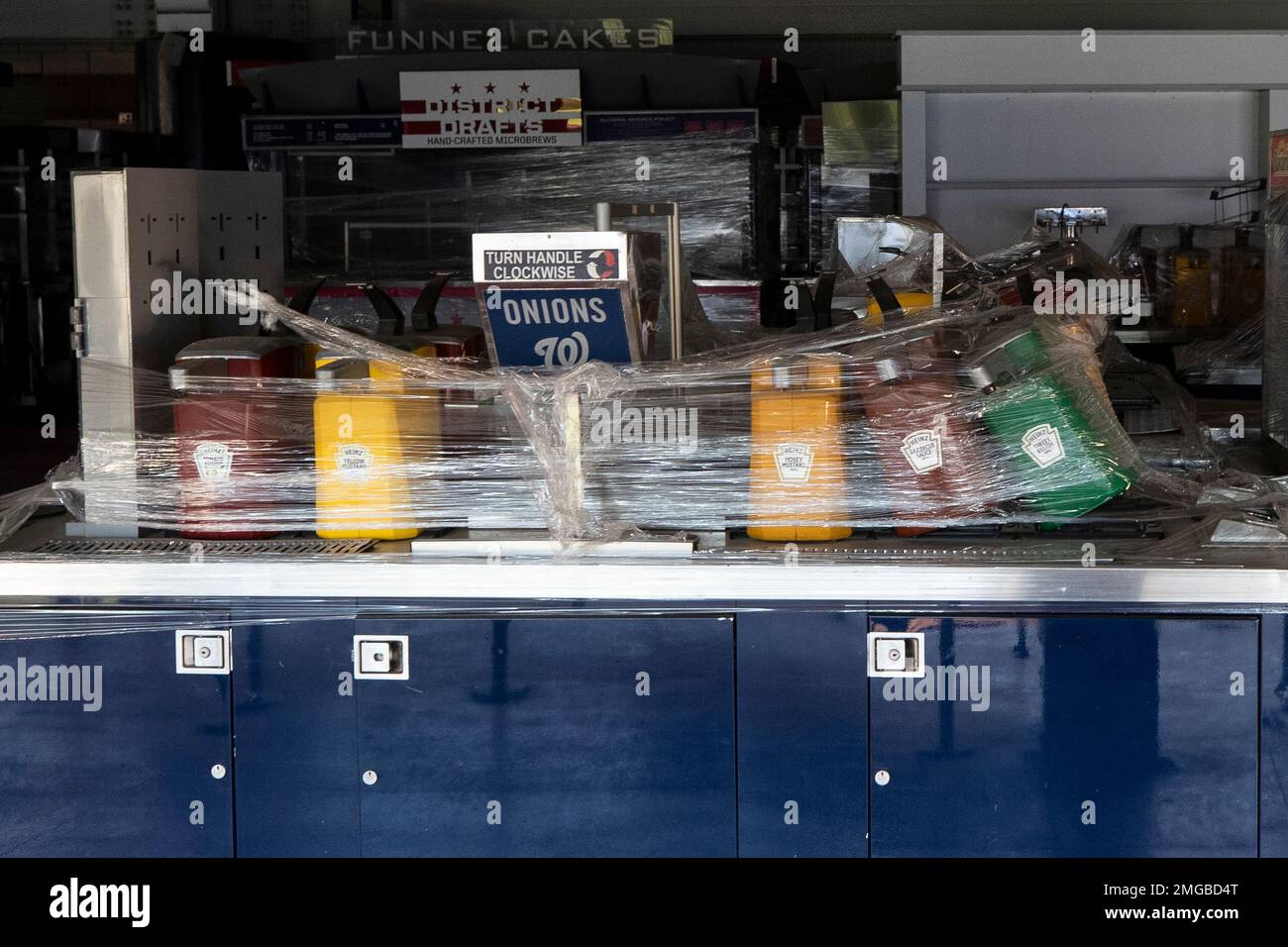 Condiments are wrapped up at a concession area during a Washington ...