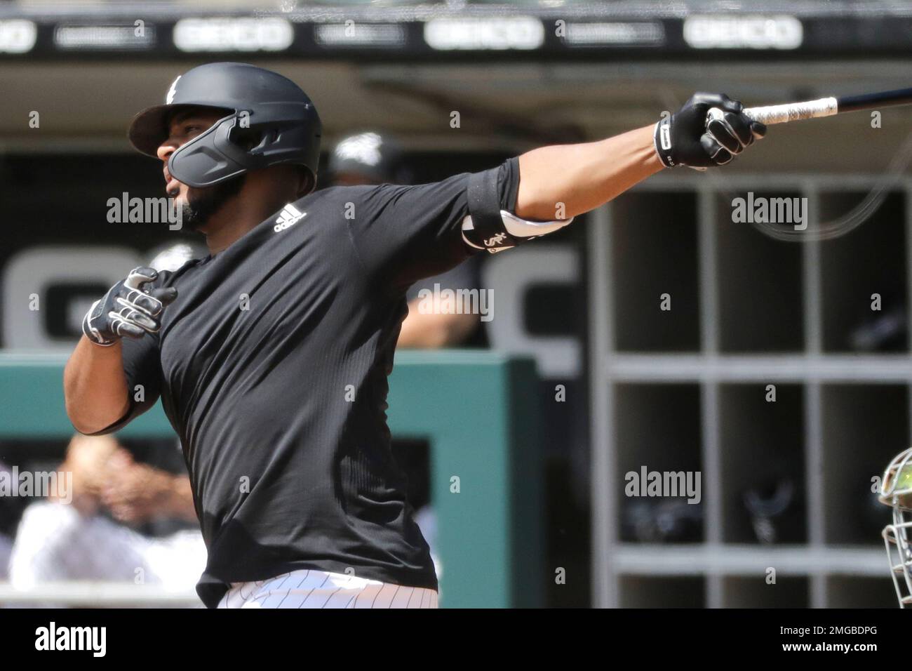 Chicago White Sox's Edwin Encarnacion hits a single during an intra ...