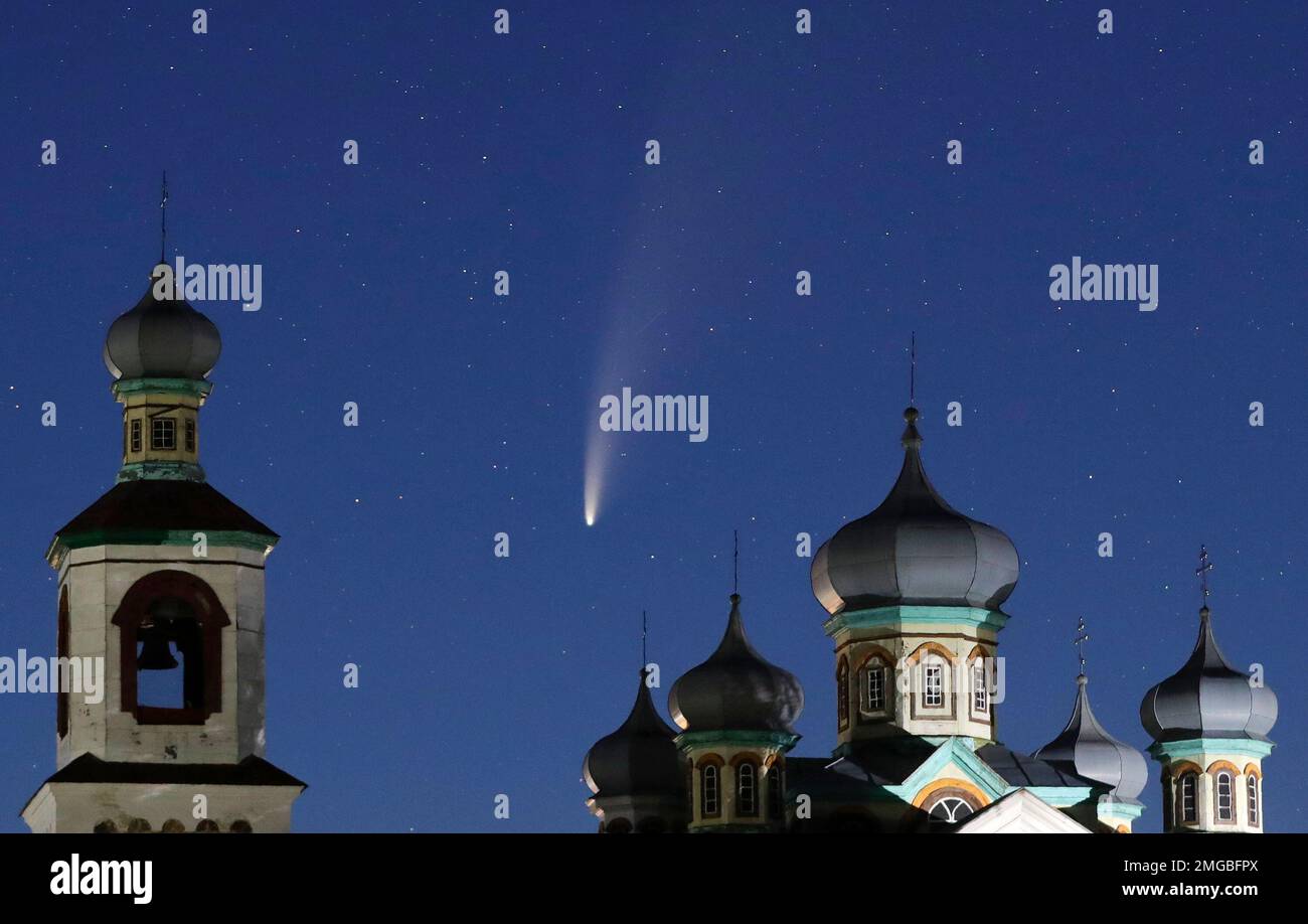 The comet Neowise or C/2020 F3 is seen behind an Orthodox church over ...