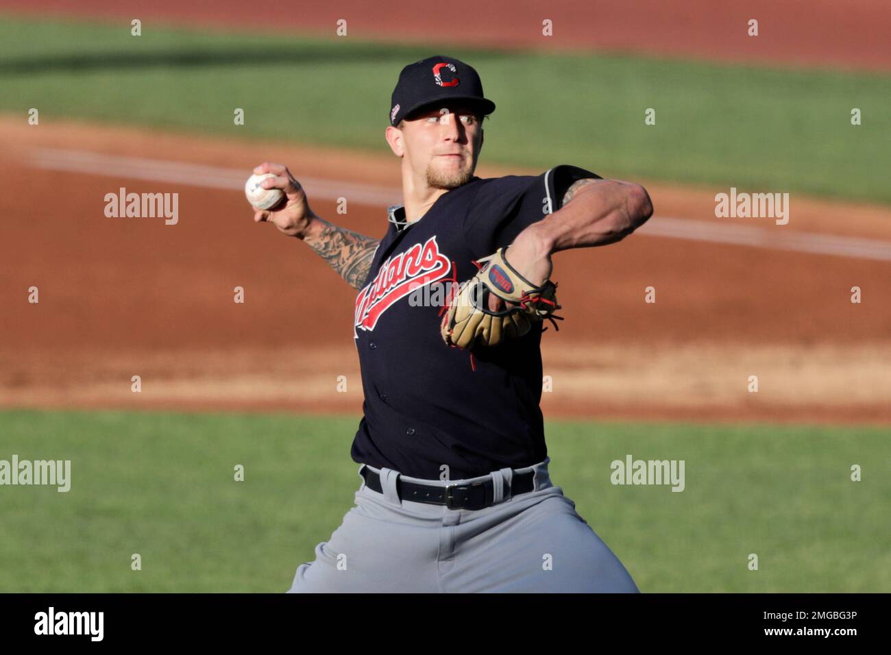 Cleveland Indians pitcher Zach Plesac delivers in the first during an ...