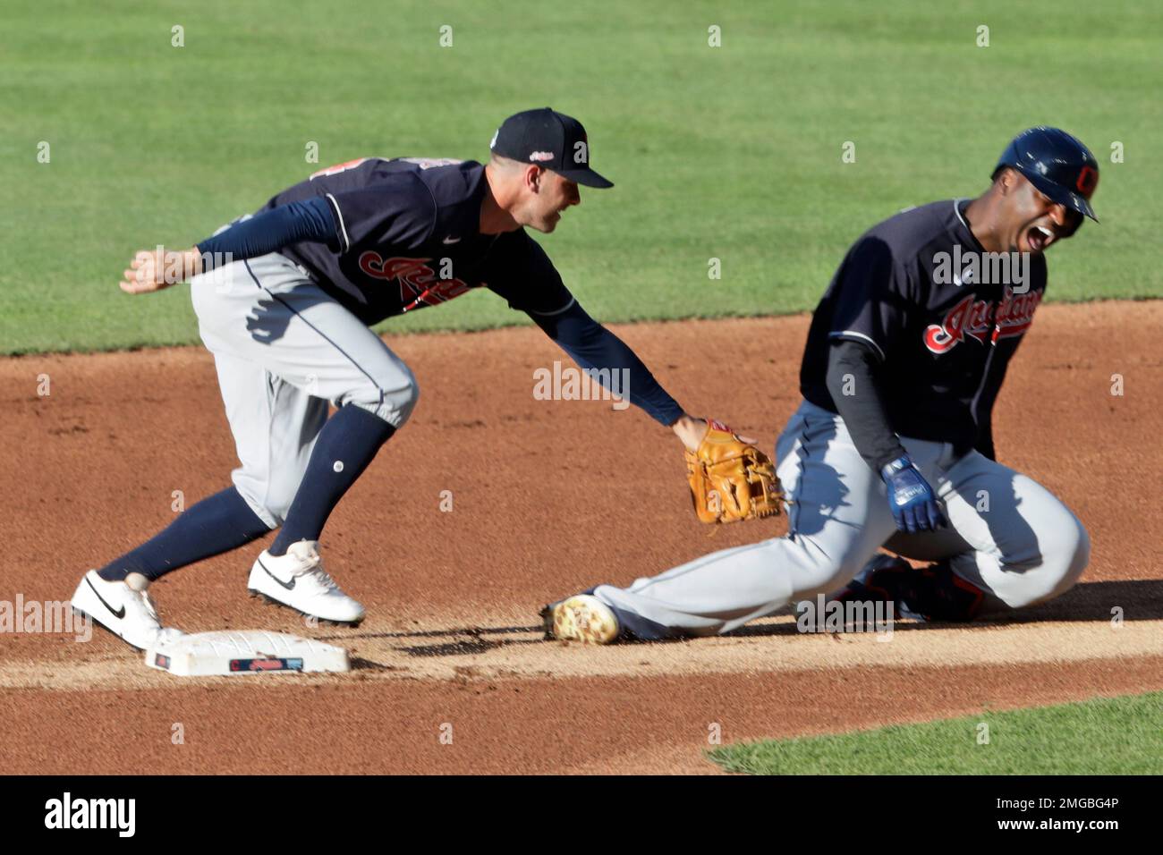 Cleveland Indians' Ernie Clement, left, tags out Franmil Reyes during ...