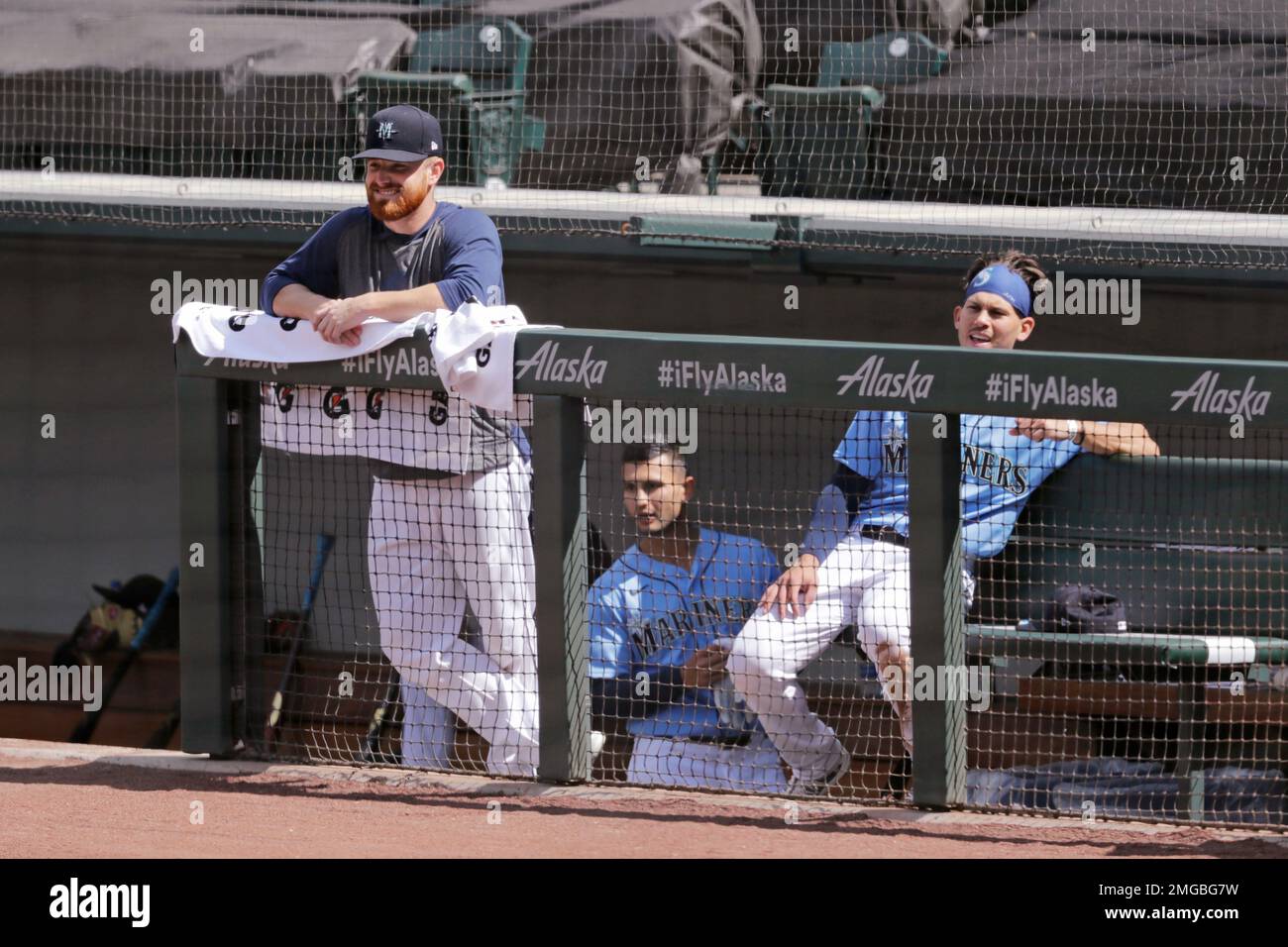 Seattle Mariners Brian O'Keefe, left, Tim Lopes and Sam Haggerty look ...