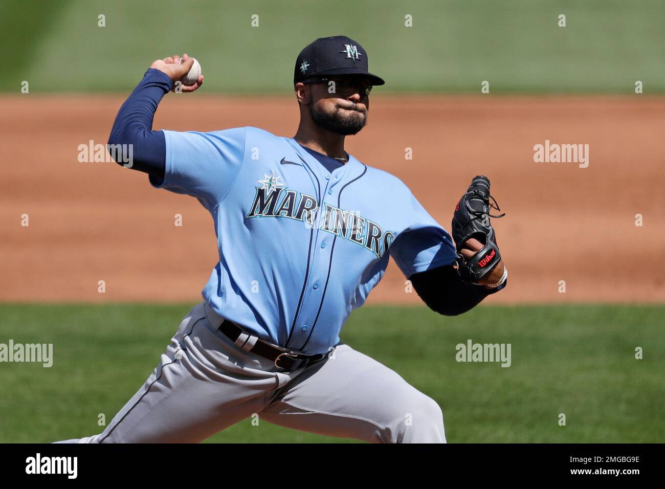 Seattle Mariners pitcher Isaiah Campbell throws during a "summer camp ...