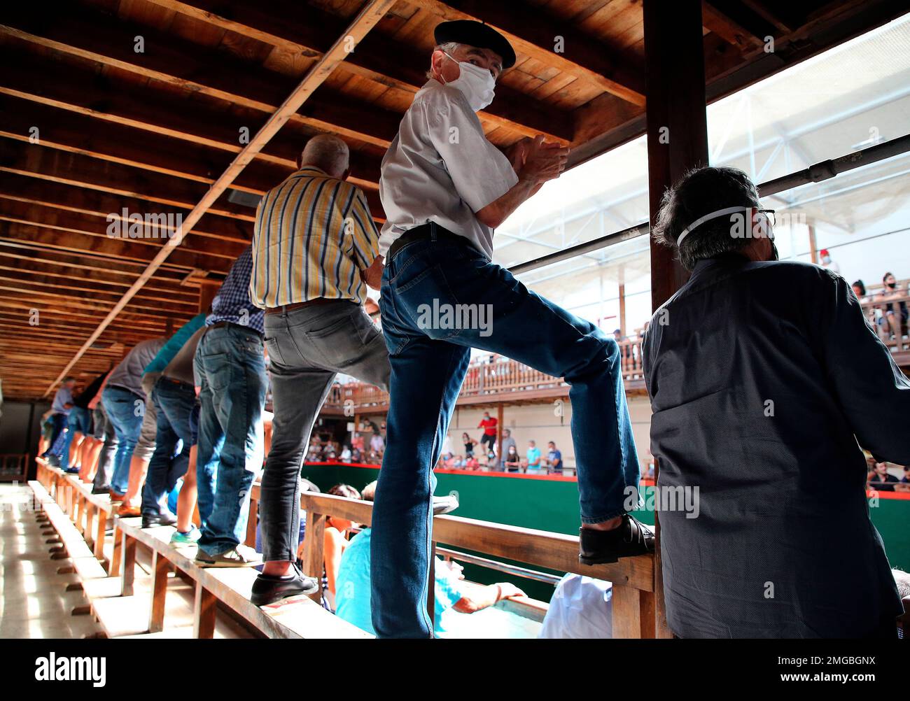 People watch a Basque ball party at Saint Jean Pied de Port court ...