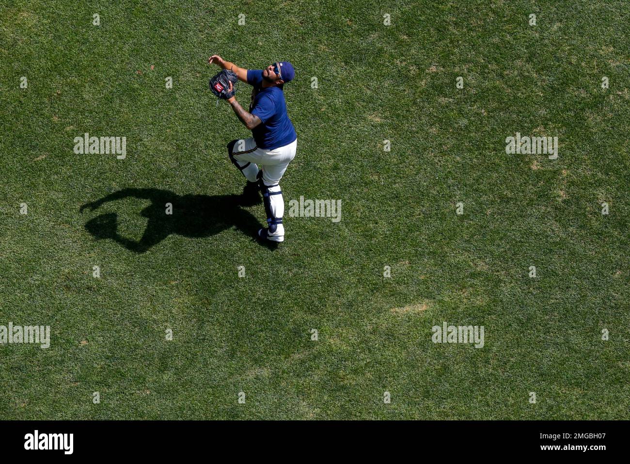Milwaukee Brewers' Omar Narvaez catches a ball during a practice ...