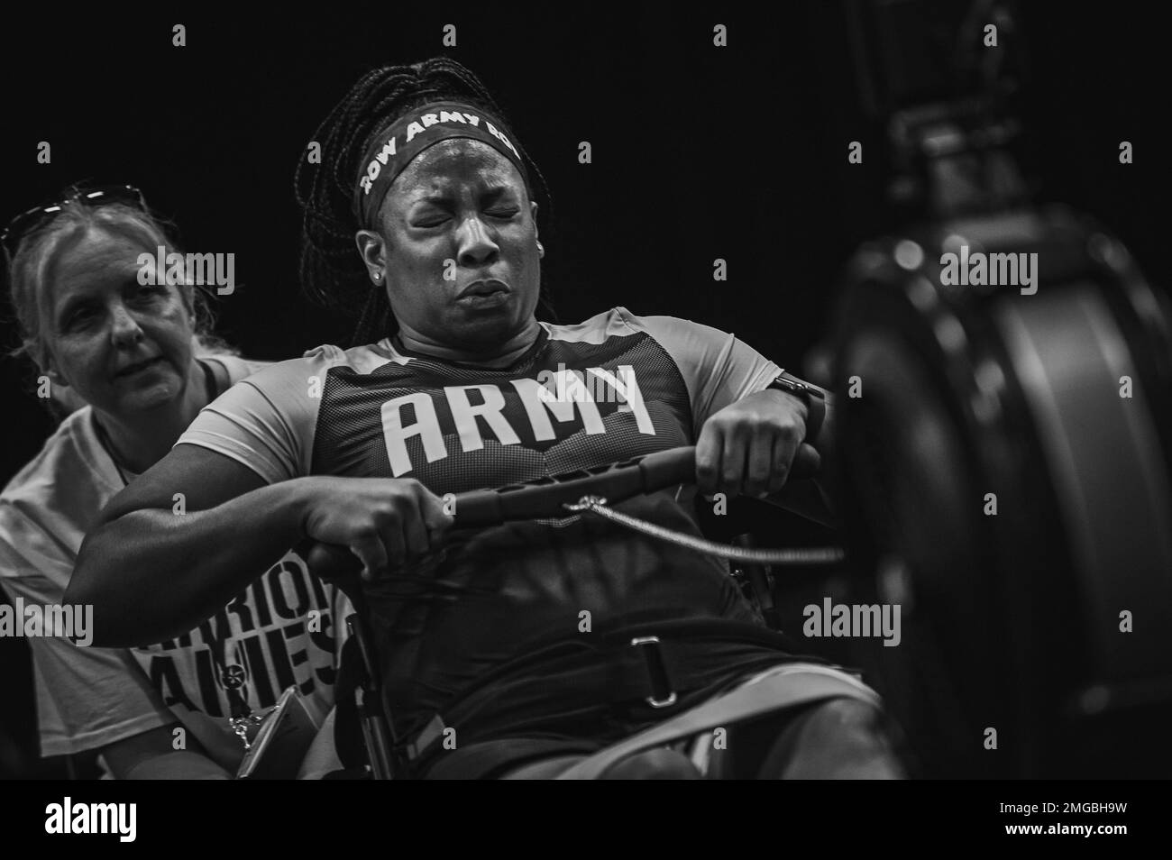 U.S. Army Pfc. Corine Hamilton heaves while competing in an indoor ...
