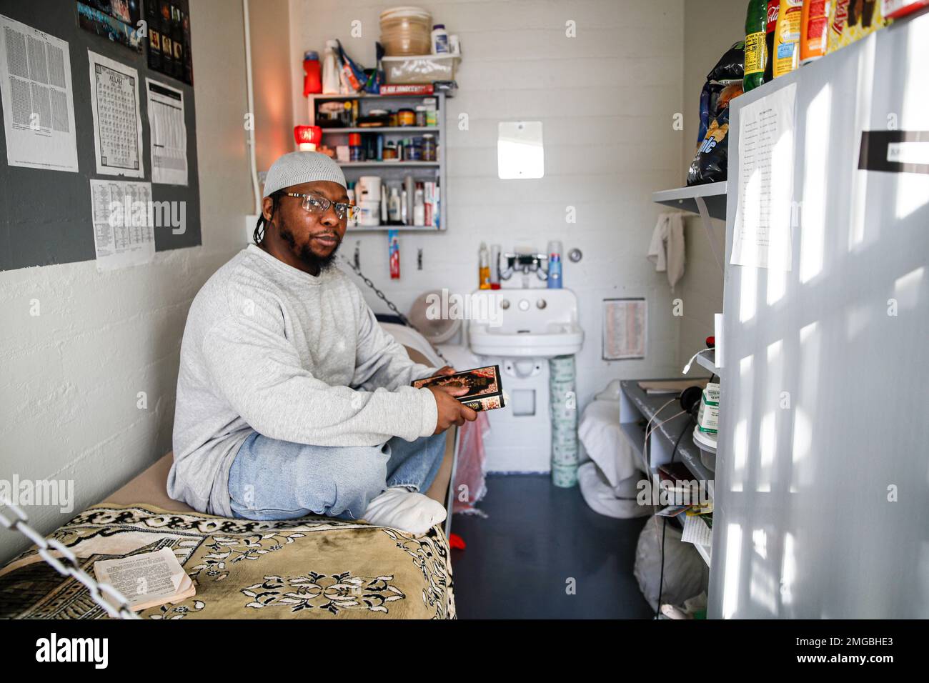FILE - In this Feb. 13, 2020, file photo, Myon Burrell sits inside his ...
