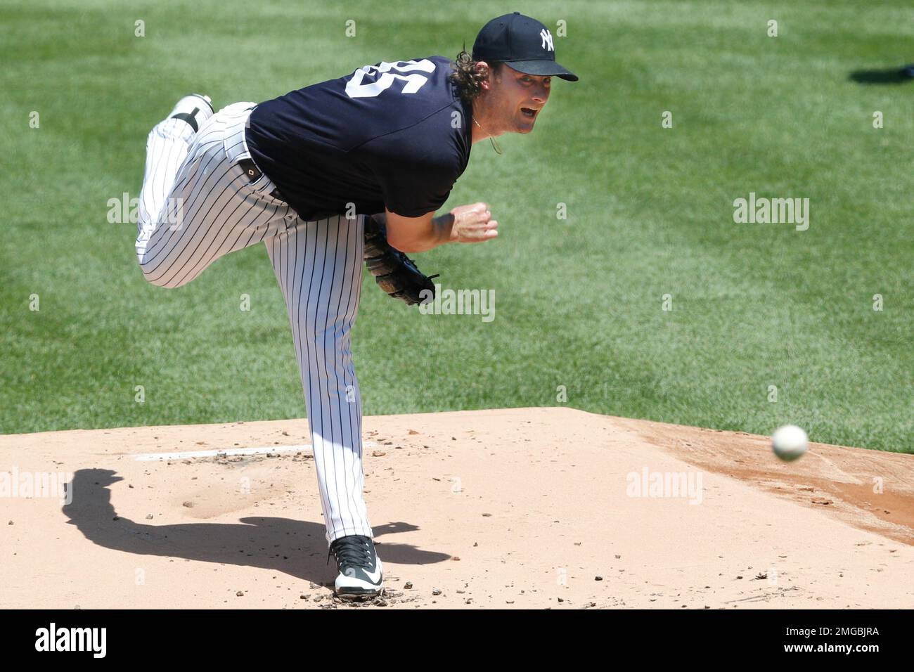 New York Yankees starting pitcher Gerrit Cole delivers a pitch during ...