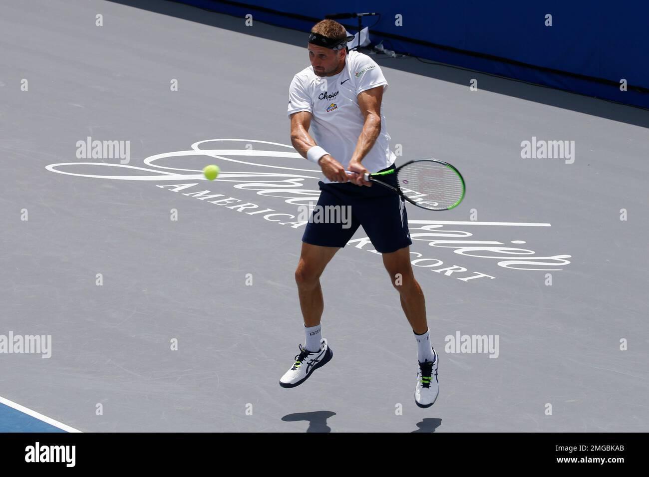 Orlando Storm player Tennys Sandgren, returns a serve at the start of ...