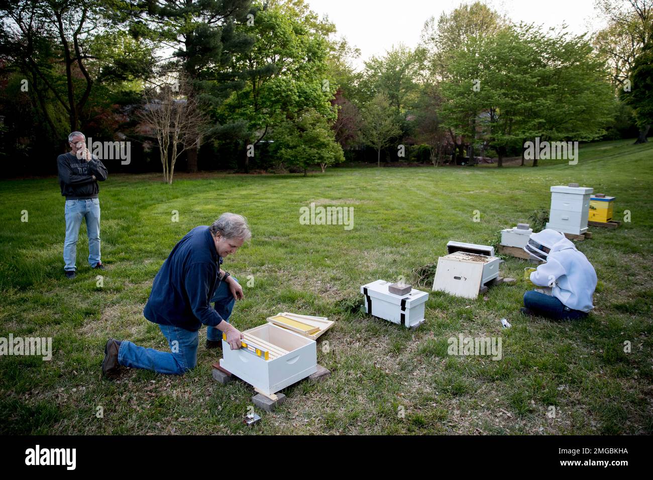 Swiss Ambassador to the US Jacques Pitteloud, left, watches as ...