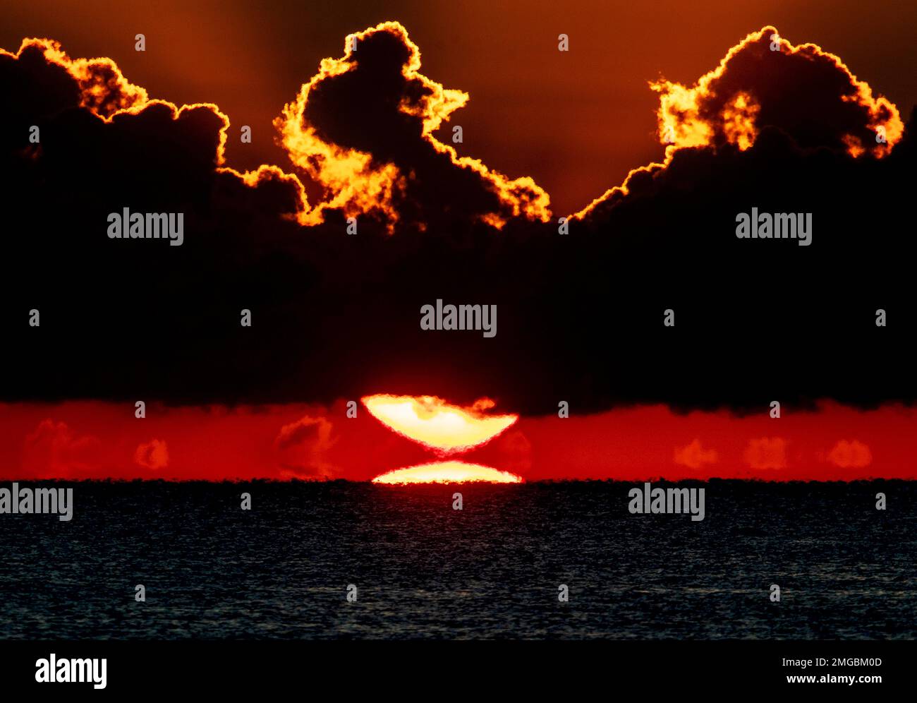 The sun rises over the Baltic Sea in Timmendorfer Strand, northern ...