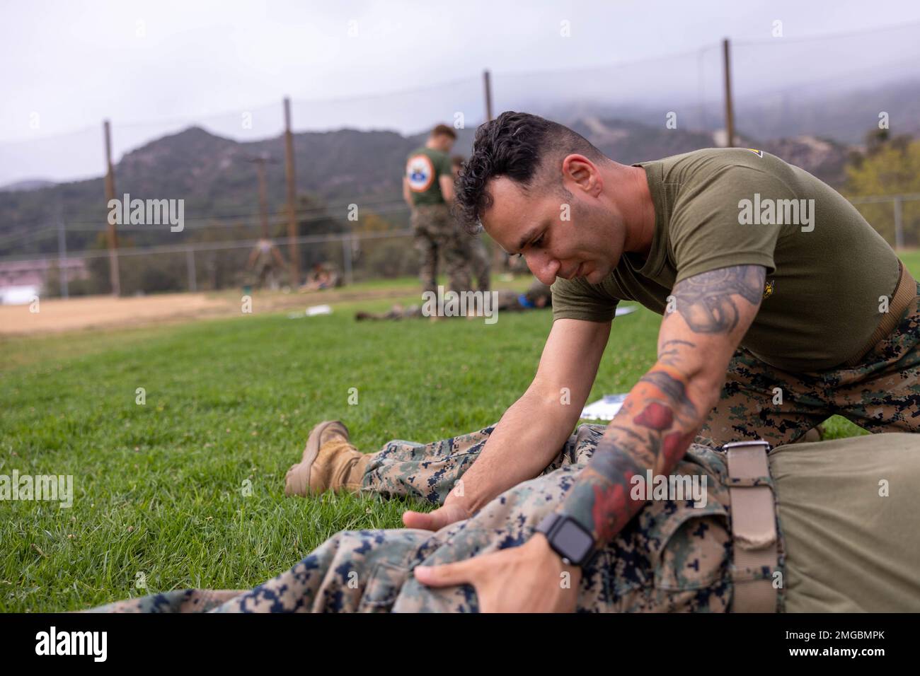 U.S. Navy Hospital Corpsmen 2nd Class Christopher Daniele with ...