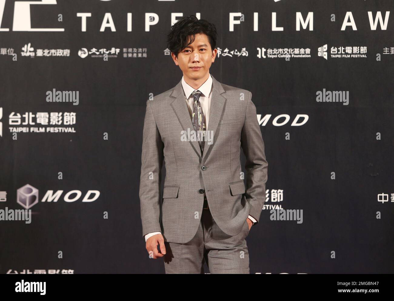 Taiwanese actor Mo Tzu-yi poses on the red carpet at the 2020 Taipei ...