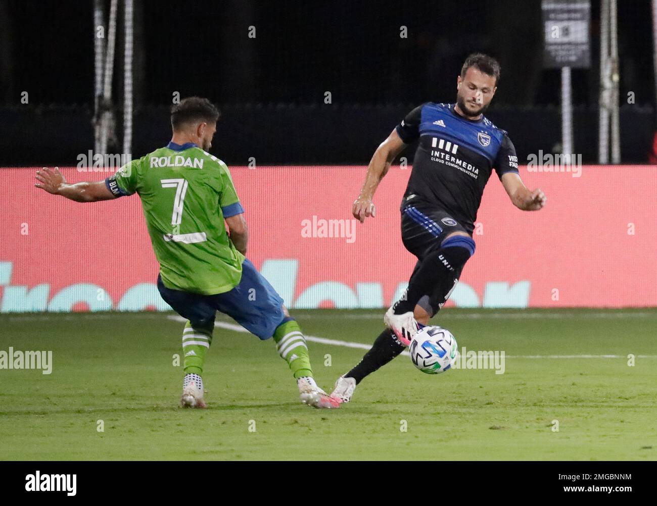 San Jose Earthquakes midfielder Vako, right, moves the ball against ...