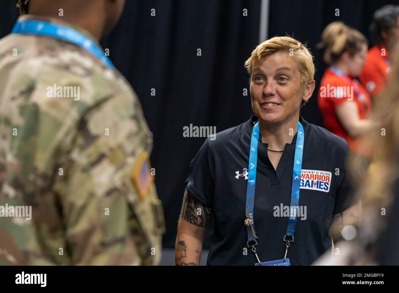 U.S. Army Staff Sgt. Stacy Englert talks with U.S. Army Col. Myron ...