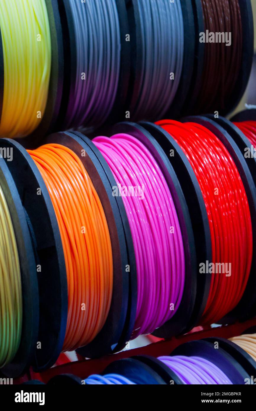 Many multi-colored spools of thread of filament for printing 3d printer ...
