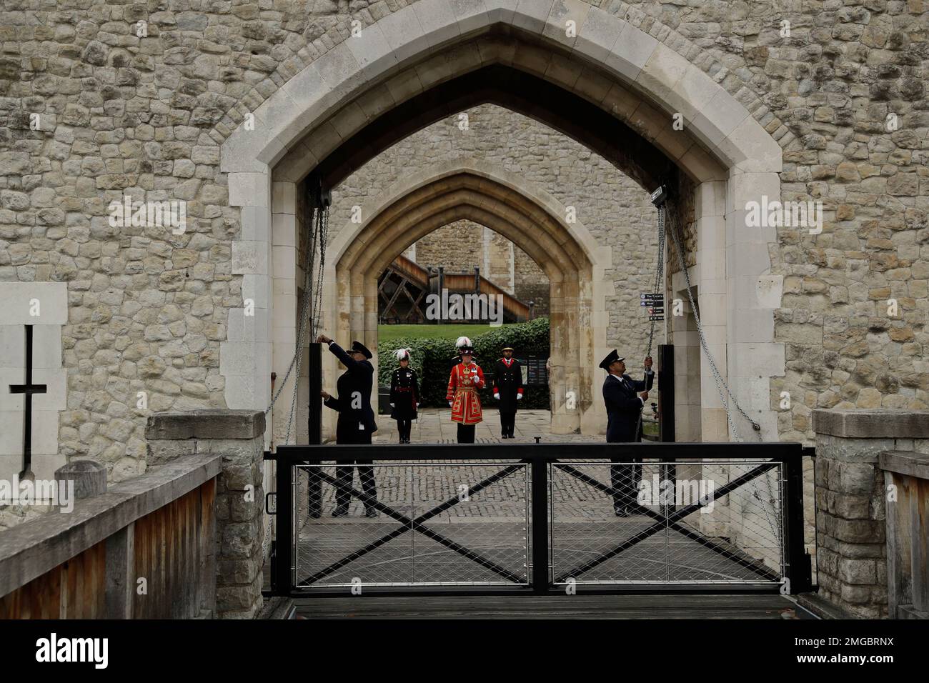 A drawbridge is lowered during a ceremony to mark the reopening of the ...