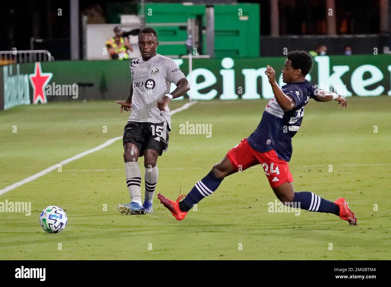 Montreal Impact's Zachary Brault-Guillard (15) passes the ball past New ...