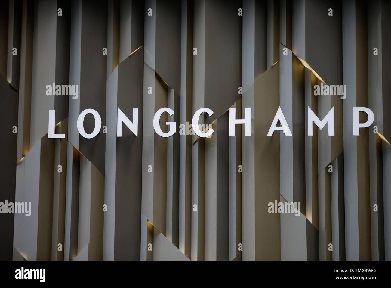 A Longchamp logo is shown outside of their 5th Avenue location ...