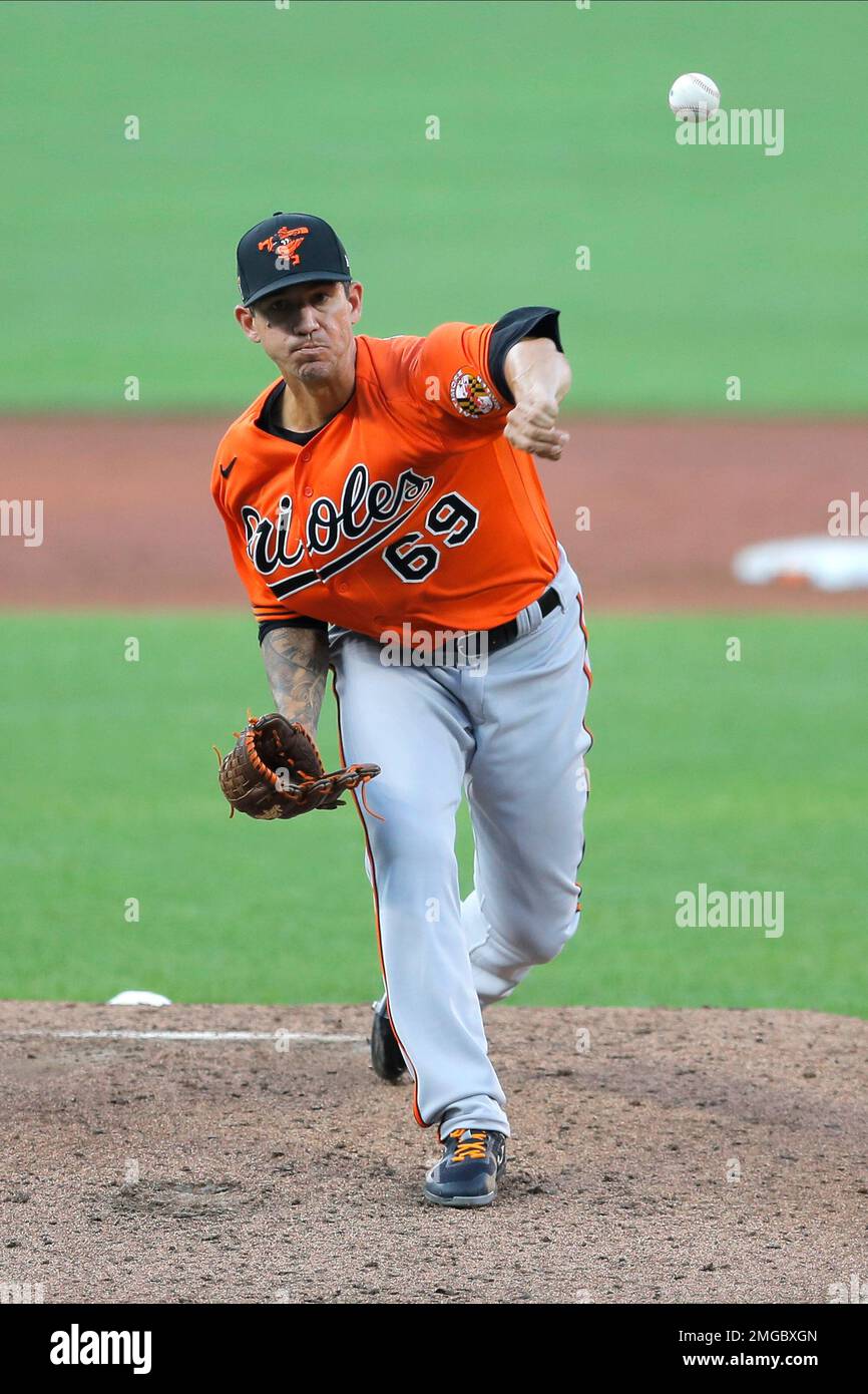 Baltimore Orioles non-roster invitee pitcher Tommy Milone throws during ...
