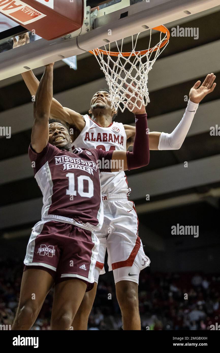Alabama forward Brandon Miller (24) blocks a shot by Mississippi State guard Dashawn Davis (10 ...