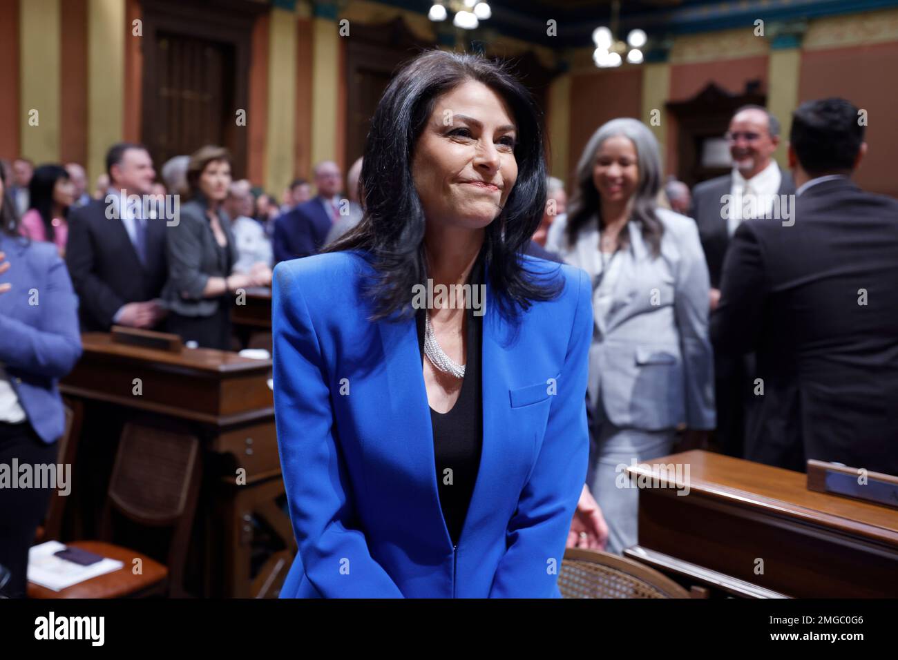 Michigan Attorney General Dana Nessel walks to her seat before the ...