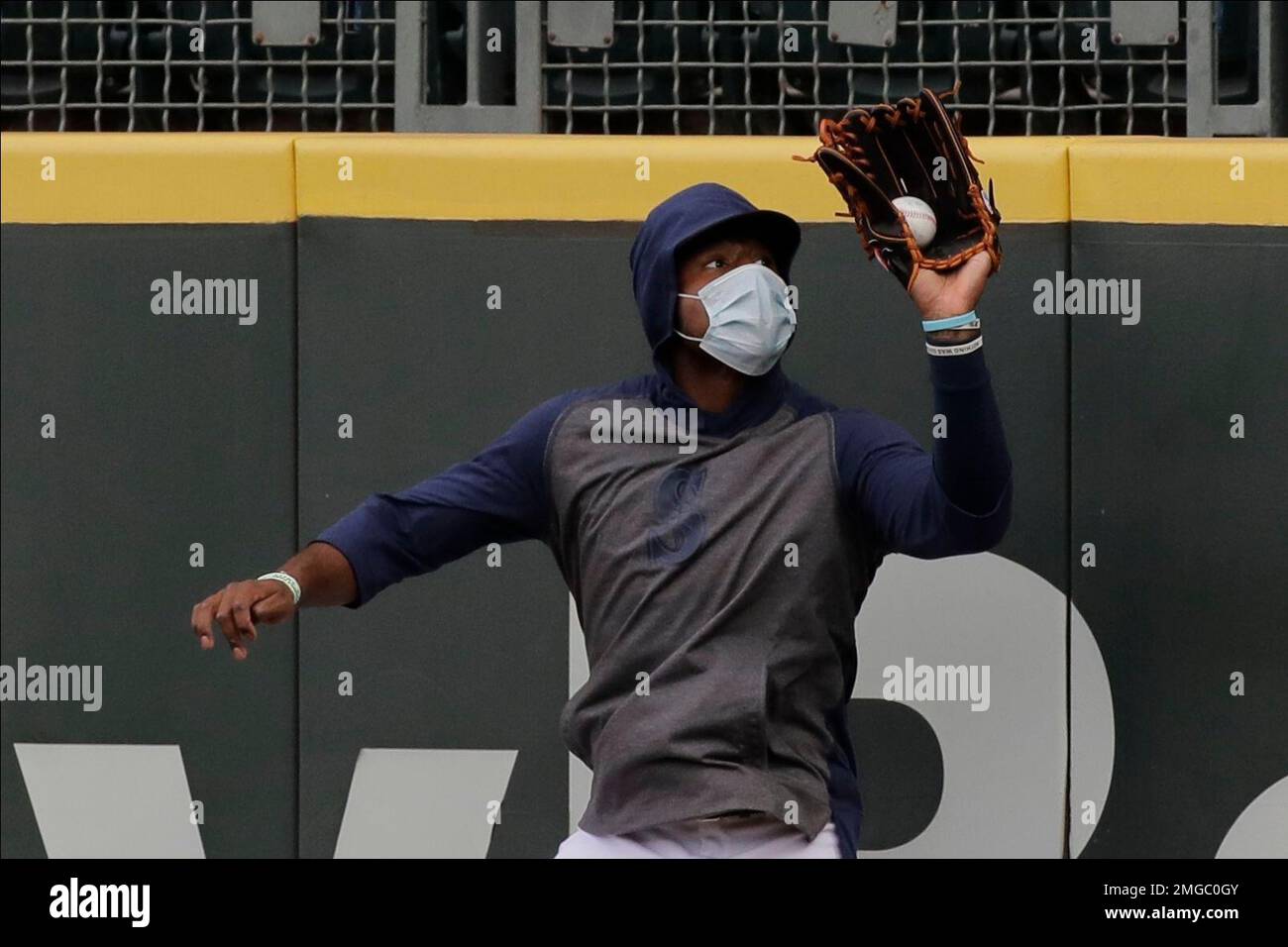 Seattle Mariners' Kyle Lewis makes a catch, Wednesday, July 8, 2020 ...
