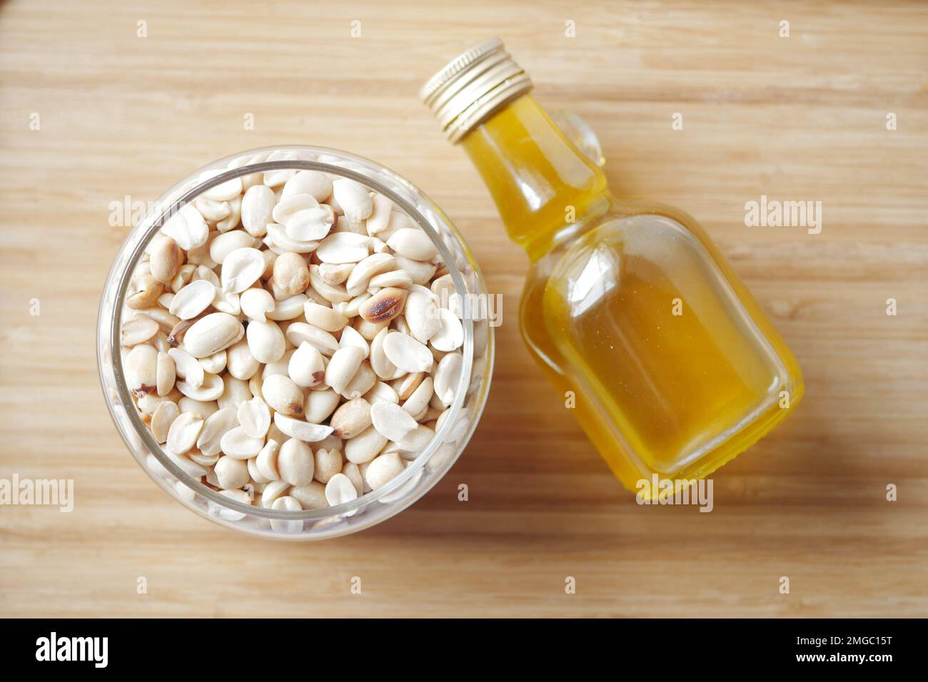 overhead shot view peanuts and oils in a container Stock Photo - Alamy
