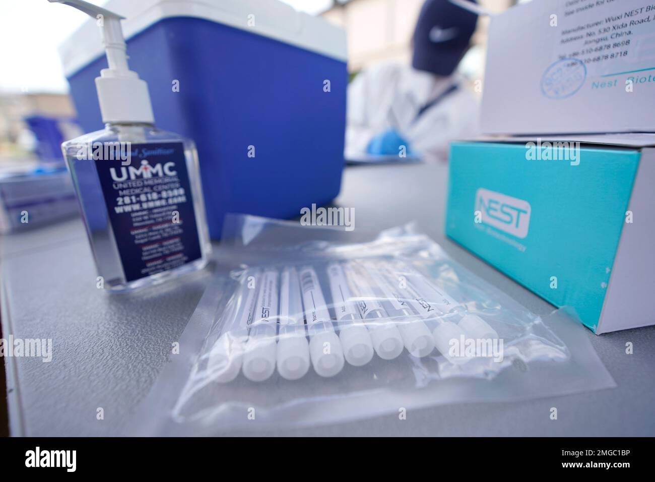 Test kits sit on the table at a United Memorial Medical Center COVID-19 ...
