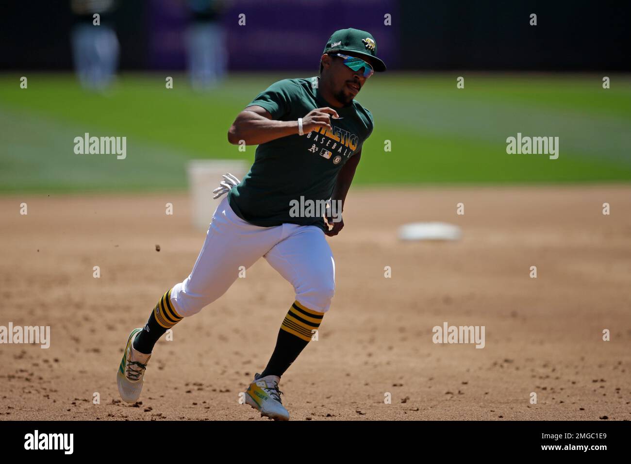Oakland Athletics' Tony Kemp runs the bases during a baseball practice ...