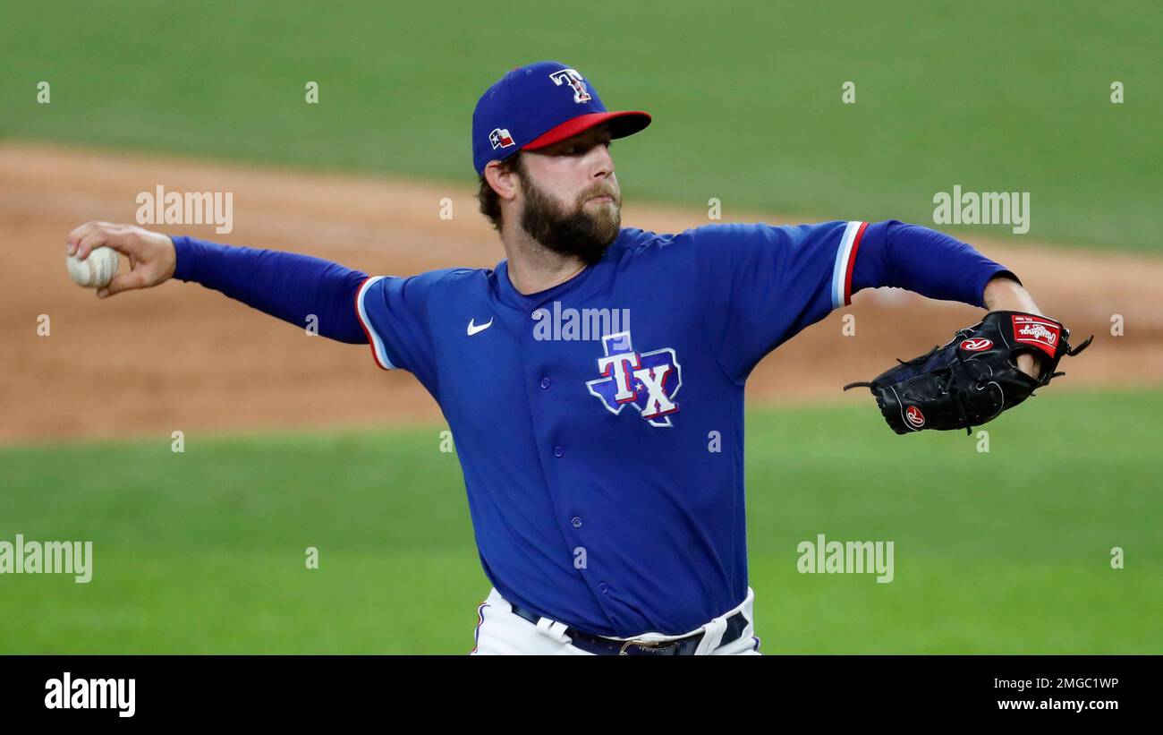 Texas Ranges pitcher Jordan Lyles throws to the plate during an ...