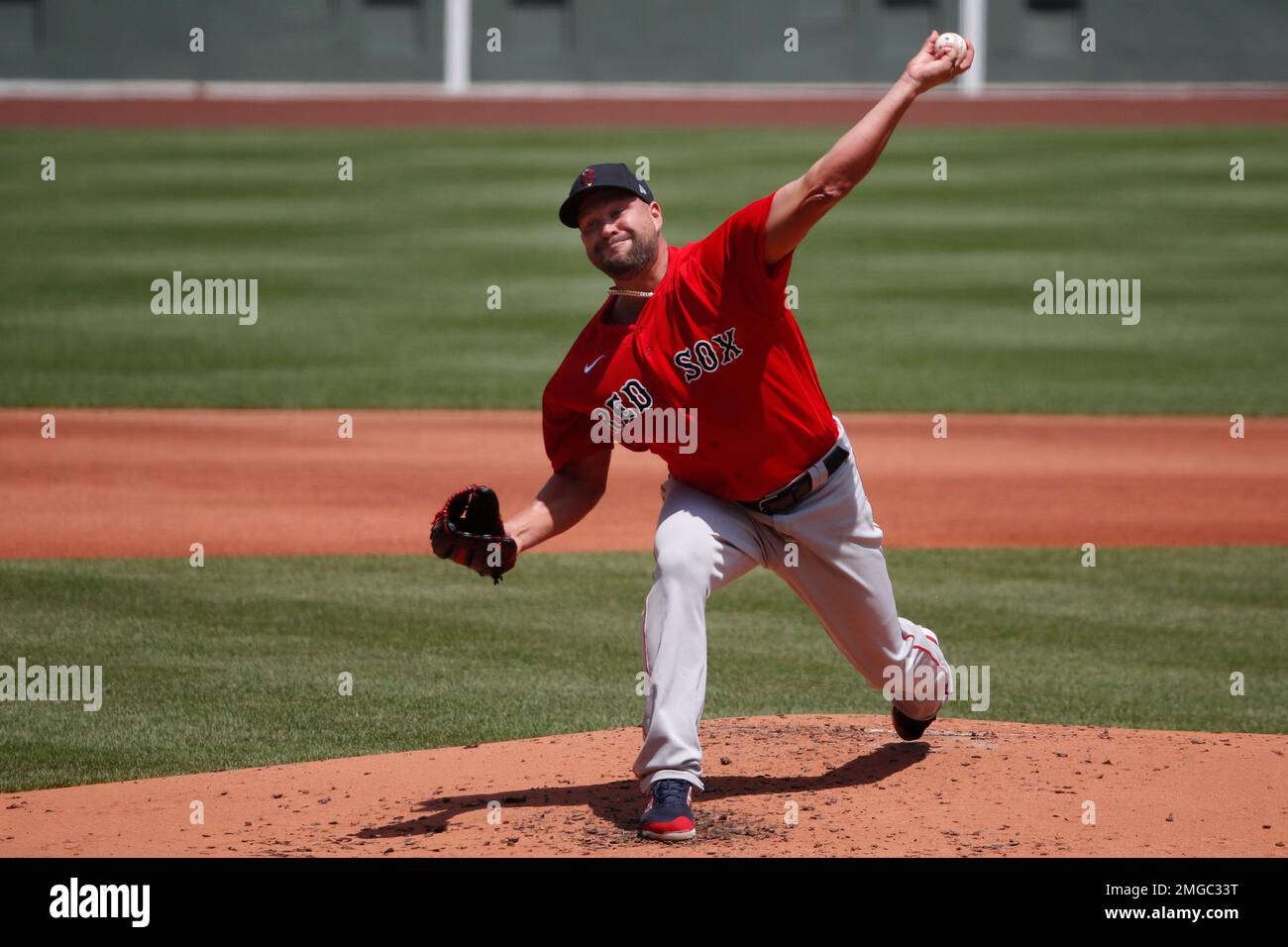 Boston Red Sox pitcher Brian Johnson delivers during baseball training ...