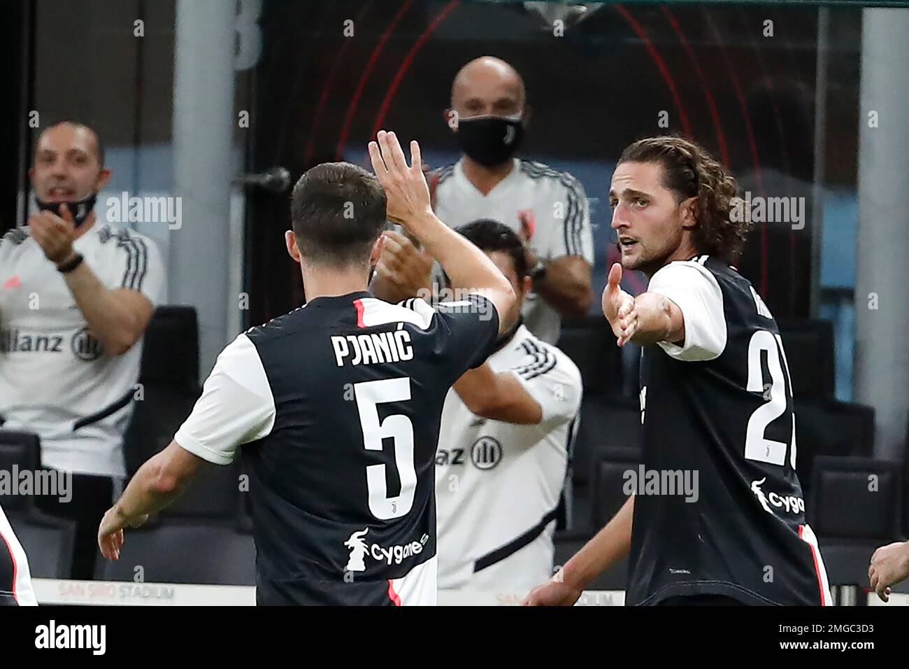 Adrien Rabiot, right, celebrates after scoring against AC Milan during ...