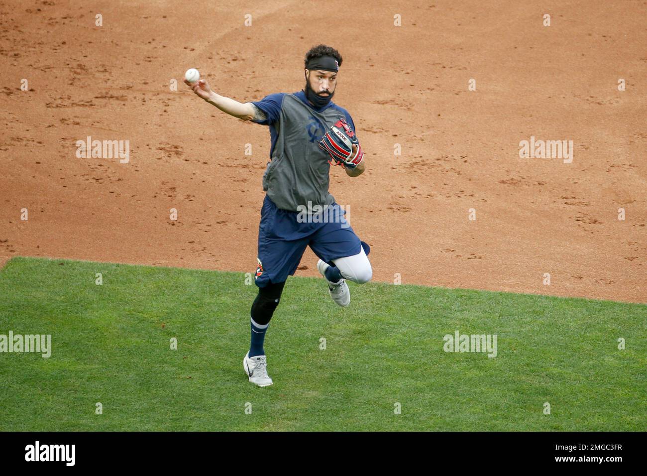 Minnesota Twins' Marwin Gonzalez fields a ball in drills at a baseball ...
