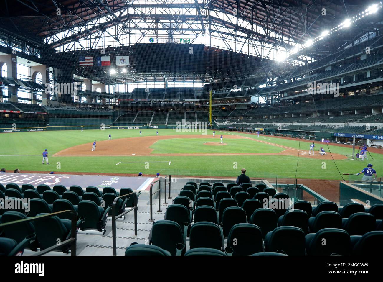 Member of the Texas Rangers play an intrasquad game during a baseball ...