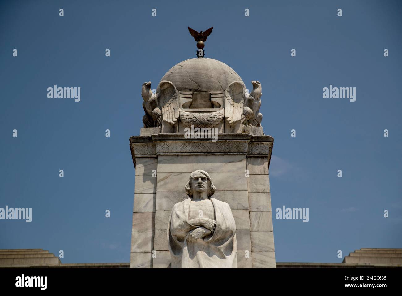 A statue of Christopher Columbus is visible on the Columbus Memorial ...