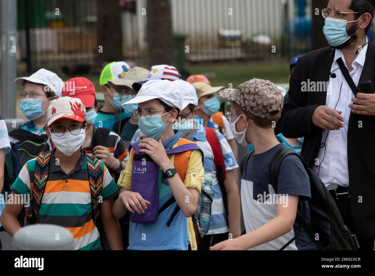 Israeli school children wear face masks to help prevent the spread of ...