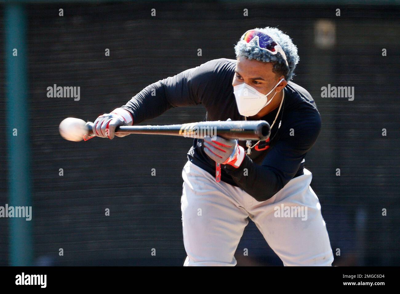 Cleveland Indians' Francisco Lindor bunts during baseball practice at ...