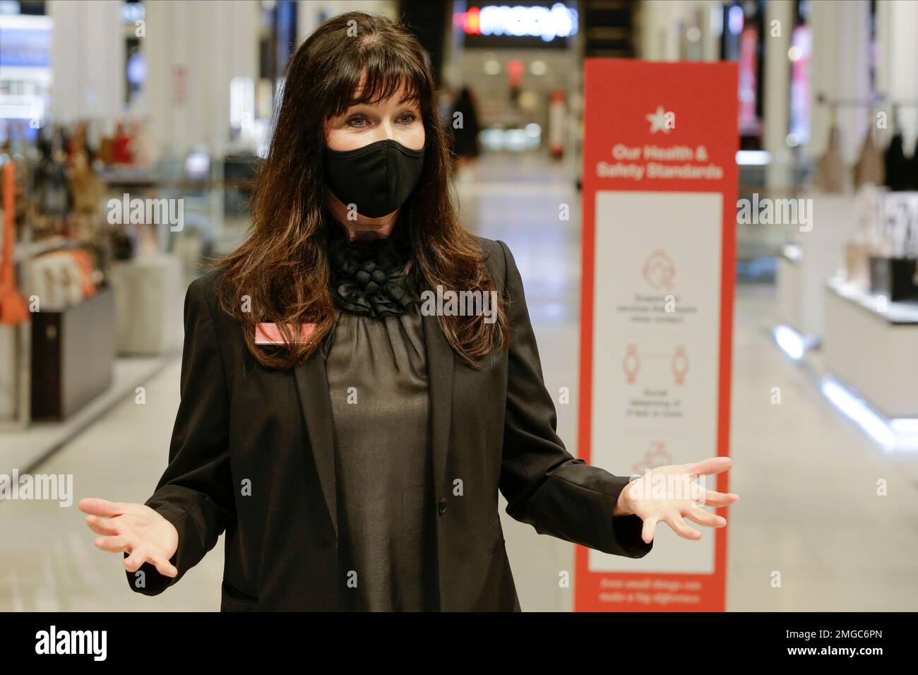 Macy's District Vice President Kathy Hilt responds to questions during ...