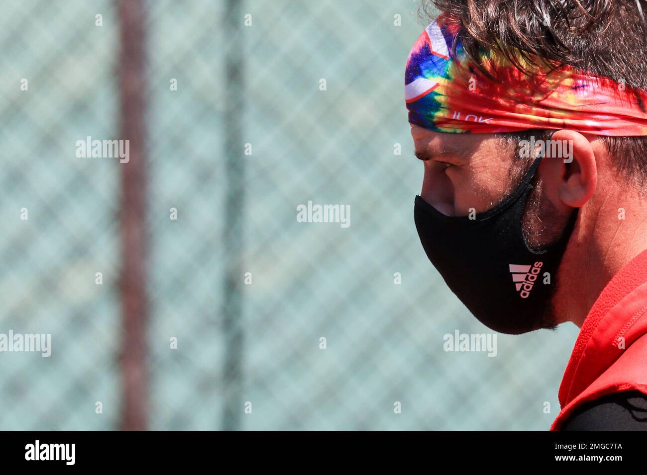 Cincinnati Reds' Mike Moustakas (9) wears an Adidas mask during team ...