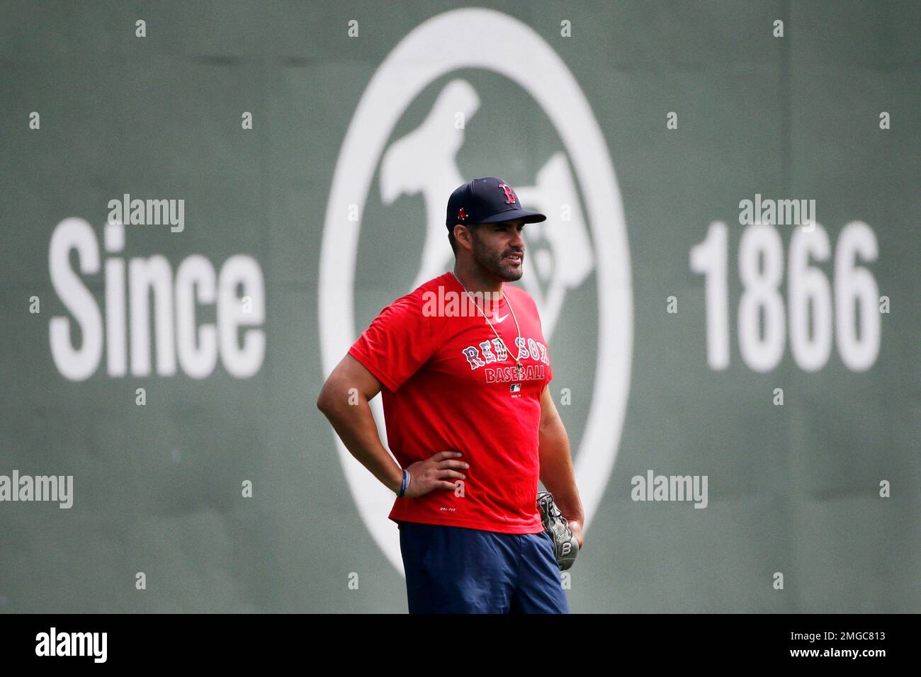Boston Red Sox's J.D. Martinez stands on the field during baseball ...