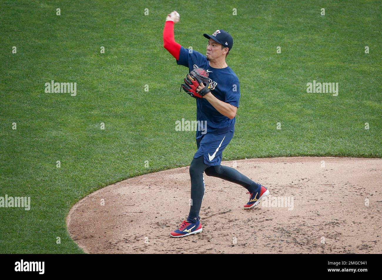 Minnesota Twins' Kenta Maeda fields a ball during a baseball camp ...