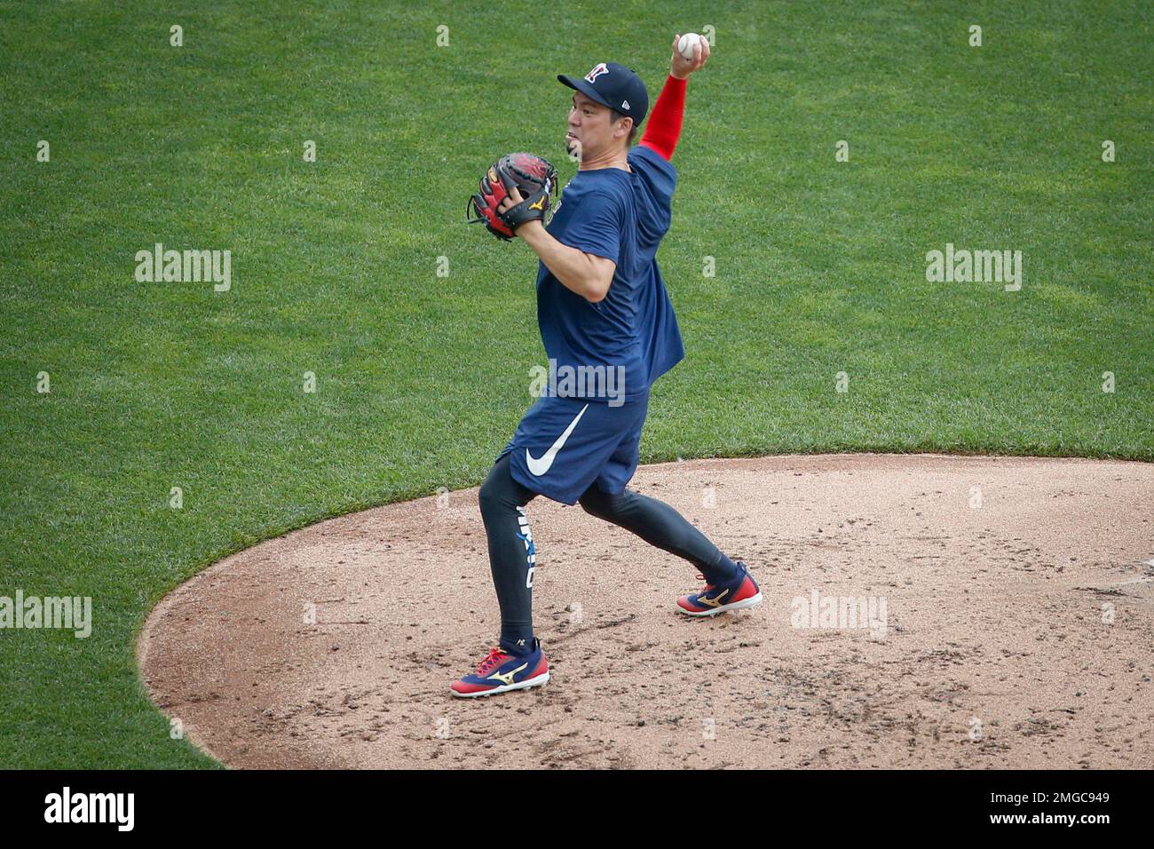 Minnesota Twins' Kenta Maeda fields a ball during a baseball camp ...