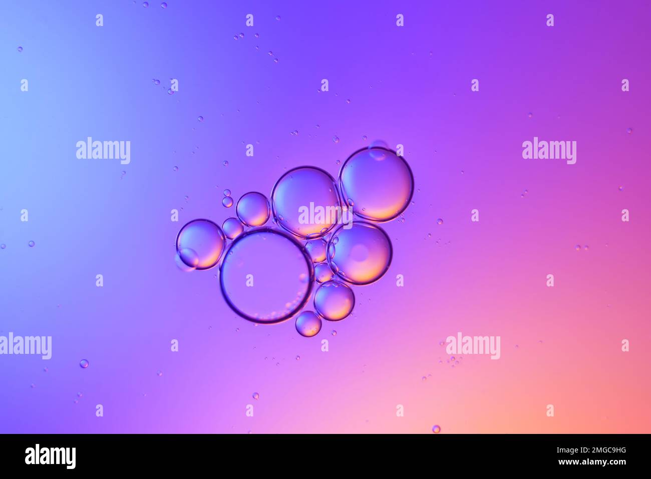 Top view movement of oil bubbles in the liquid. Oil surface ...